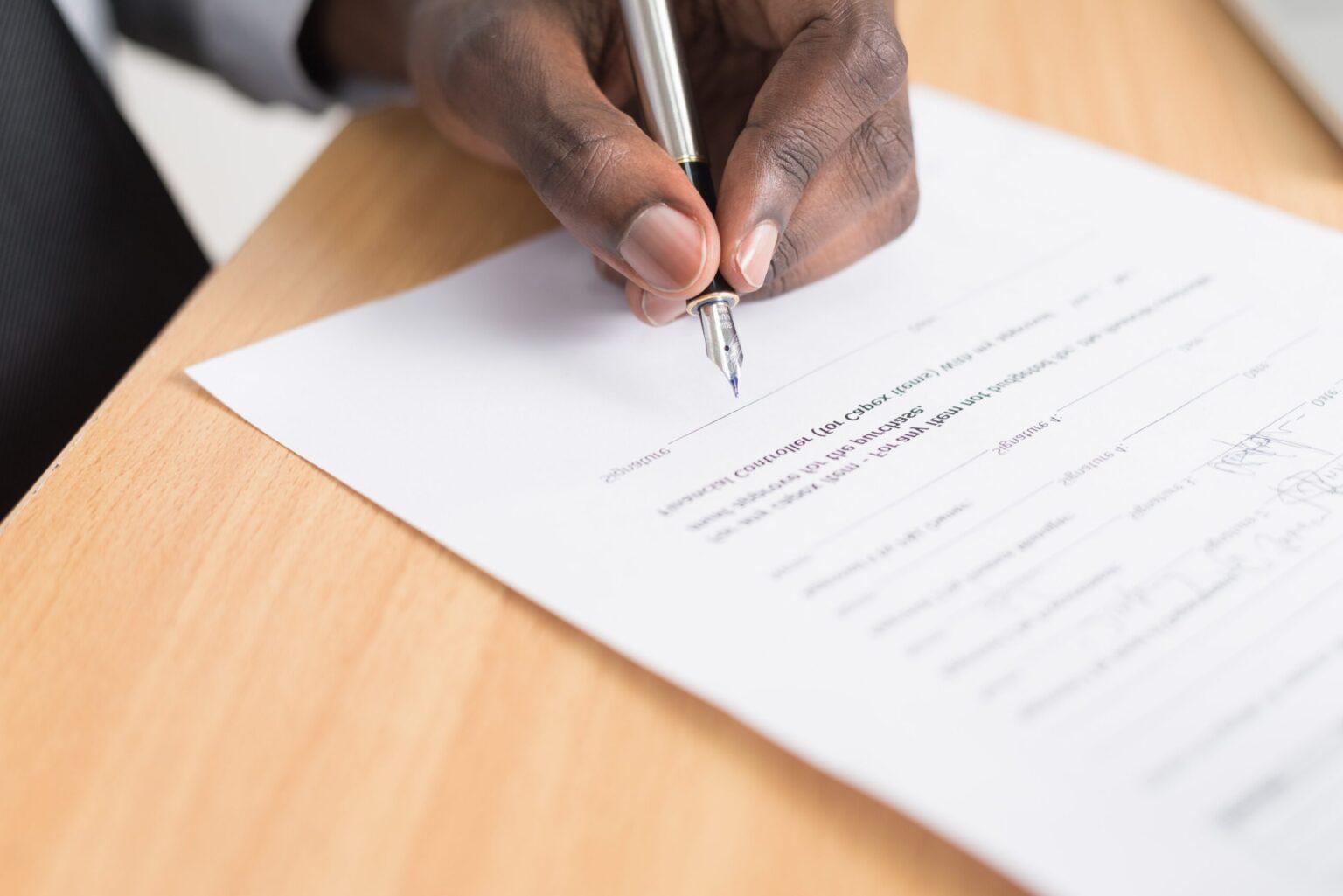 person signing contract - Family Law Advisor